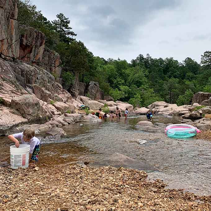 Summer days here mean kids splashing, floaties bobbing, and families creating memories that'll last longer than the rocks themselves.