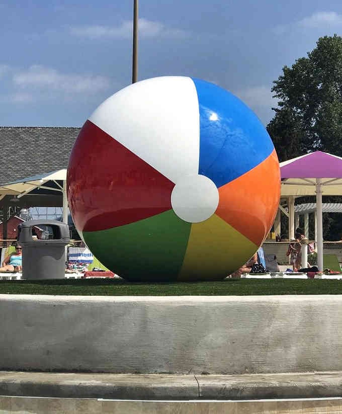 This beach ball is larger than most studio apartments and somehow more photogenic than your entire family.