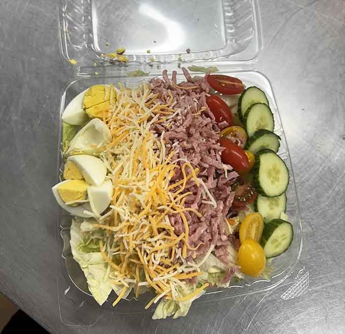 A chef salad so generously loaded with ham, cheese, and fresh veggies, it's practically a meal planning itself.