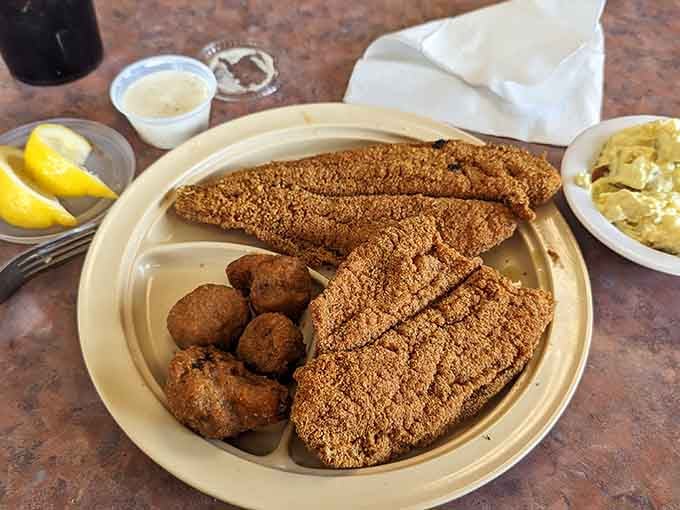 Golden-fried catfish fillets with hush puppies&mdash;Southern Illinois knows how to treat fish right, folks.