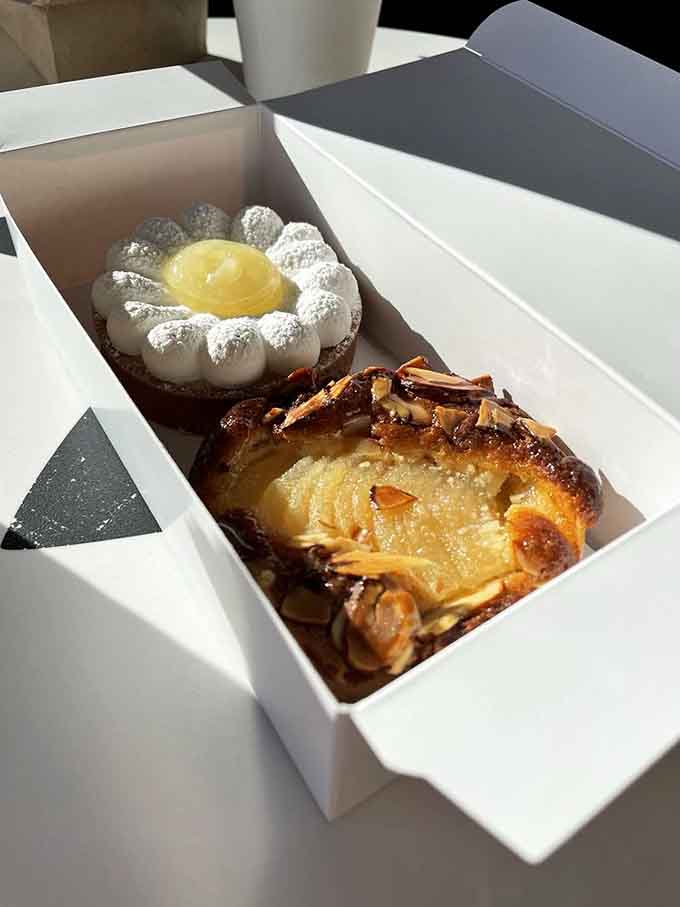 Two tarts walk into a bakery case, and suddenly you're questioning every life choice that delayed this moment.