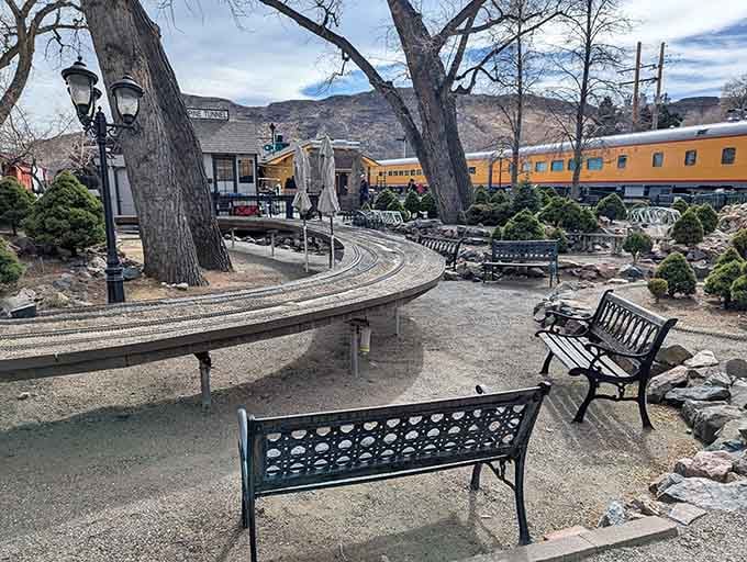 Benches invite you to sit and imagine the passengers who once waited here for adventures.