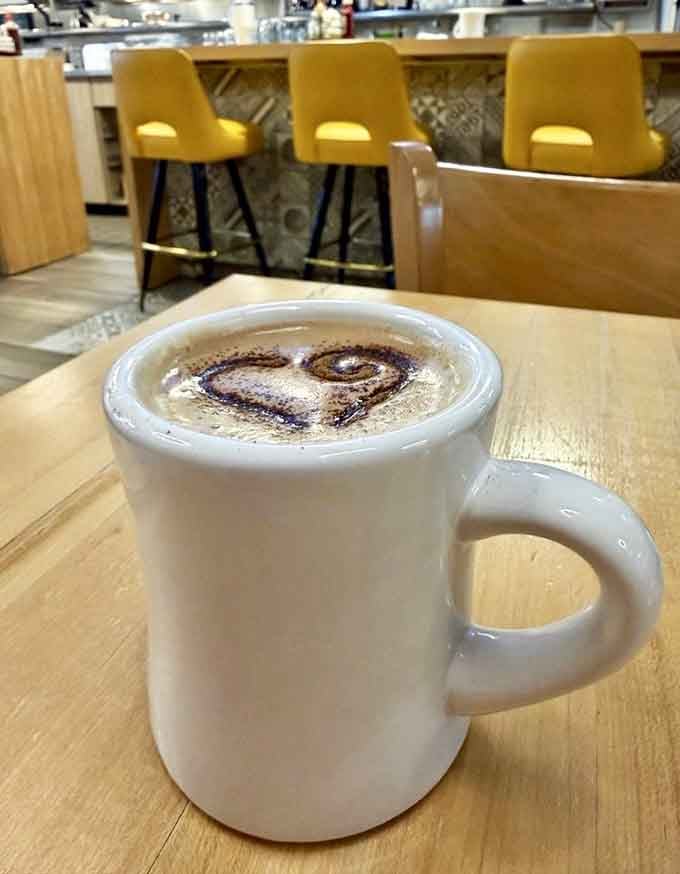 That heart-shaped latte art is telling you something important: this coffee was made with love.