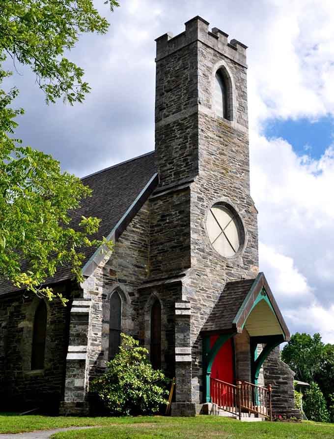 Stone churches rise majestically along Route 169, their steeples pointing heavenward like architectural exclamation points of faith.