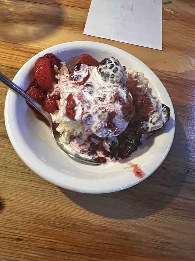 After conquering that massive main course, somehow there's always room for this sweet finale with strawberries and whipped cream.