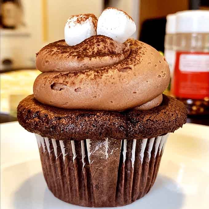 Topped with marshmallows and cocoa, this cupcake captures winter comfort in one perfect little package.