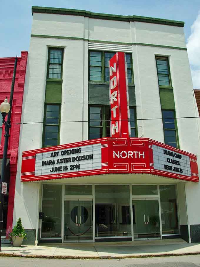 That classic Art Deco marquee in brilliant red still lights up Main Street like it's 1941.