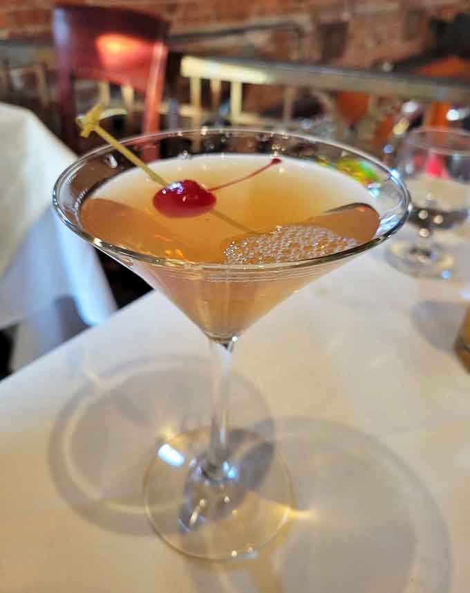 This cocktail arrives with enough flair to make you feel fancy, even if you're wearing sweatpants under the table.