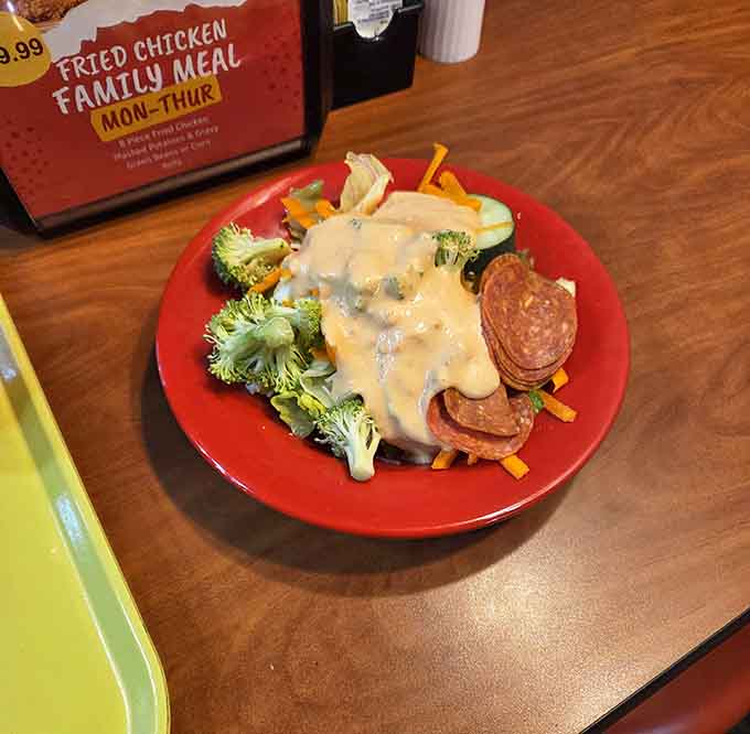 Even the salad gets the buffet treatment here, because vegetables deserve their moment in the sneeze-guard spotlight too.