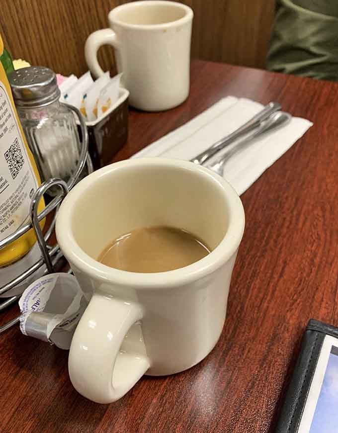 Hot, strong diner coffee that keeps appearing in your cup like some caffeinated magic trick.