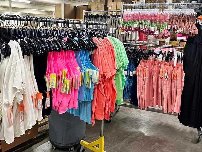 Clothing racks bursting with colorful options that prove style doesn't require draining your savings account.