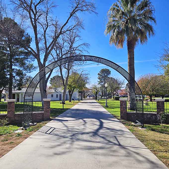 This elegant archway frames a peaceful walkway where you can stroll without dodging electric scooters or influencers.