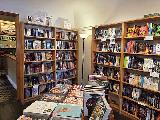 Organized shelves divided by genre make finding your next great read easier than finding your reading glasses.