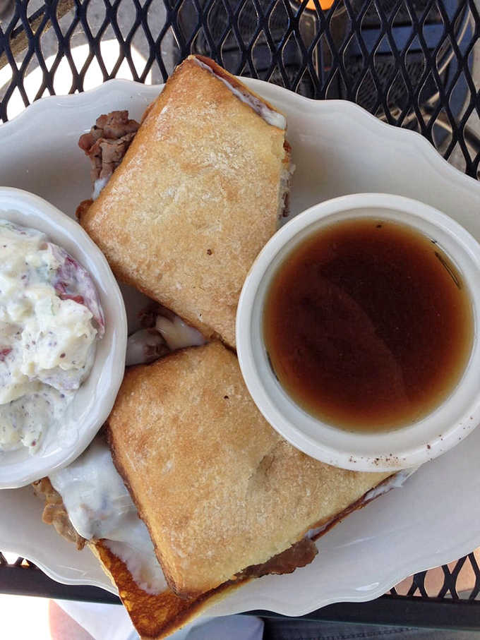 The French dip sandwich arrives with au jus for dunking and coleslaw that's practically begging to be devoured.