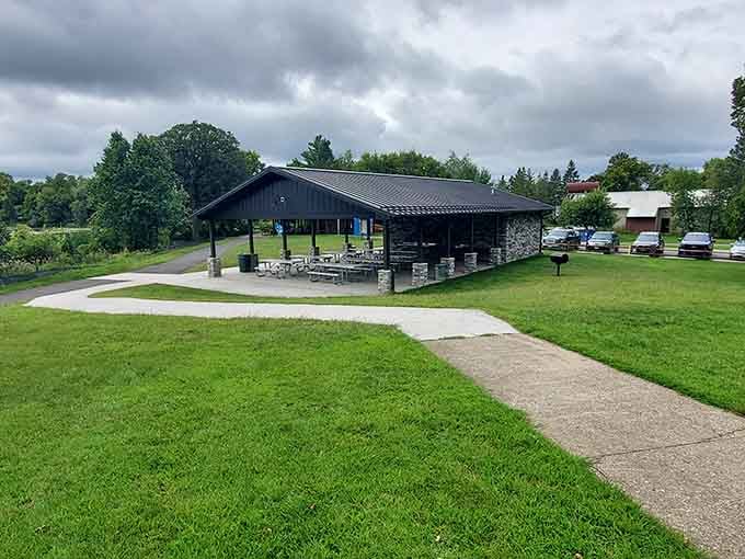 The pavilion stands ready for your family reunion, complete with grills and zero awkward small talk guaranteed.