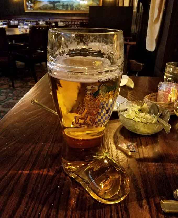 A proper German boot glass filled with golden lager, because regular glasses are for people without imagination.