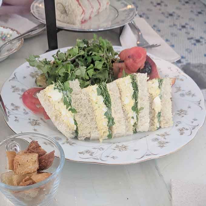 Crustless finger sandwiches with fresh greens remind us that sometimes the simplest preparations are the most satisfying and elegant.