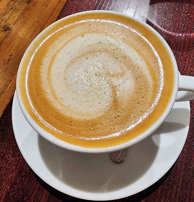 That latte art swirl is almost too pretty to drink&mdash;almost, but not quite, because coffee waits for no one.