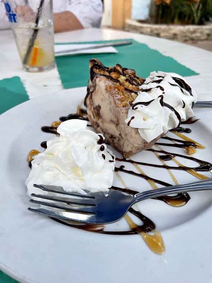 Peanut butter ice cream pie drizzled with chocolate and caramel, proving dessert is always worth saving room for.