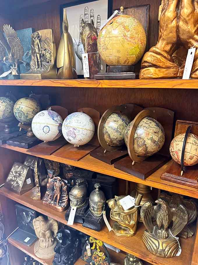 Globes and brass collectibles transport you to when home d&eacute;cor had actual character and weight.