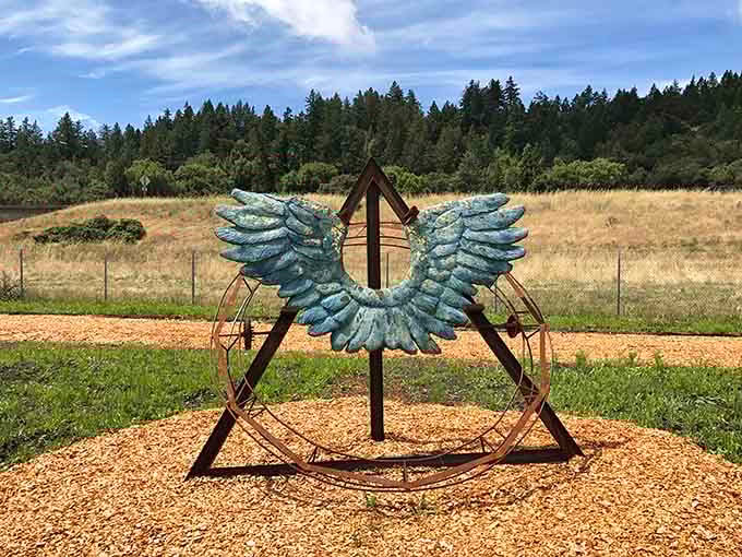 Turquoise wings spread wide on this triangular frame, ready to lift dreams straight up into the California sunshine.