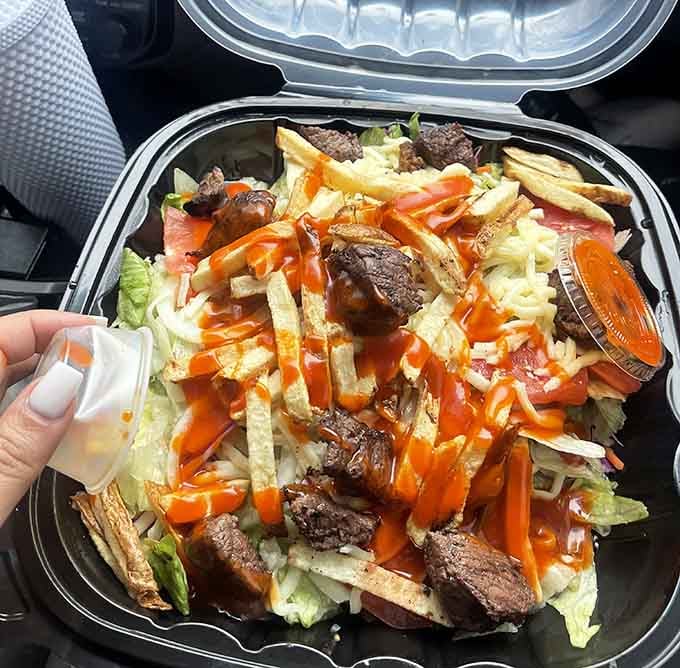 Even the salads get the barbecue treatment here, topped with enough smoked meat to satisfy any carnivore's conscience.