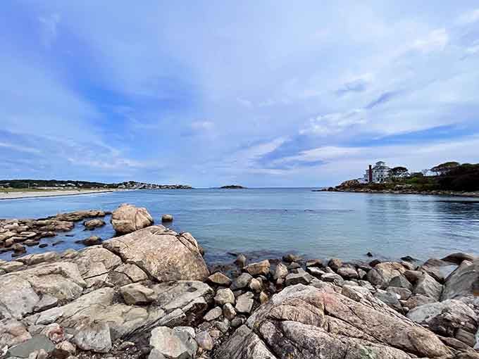 The rocky shoreline frames tranquil waters that look calm enough to make even nervous swimmers reconsider their pool-only policy.