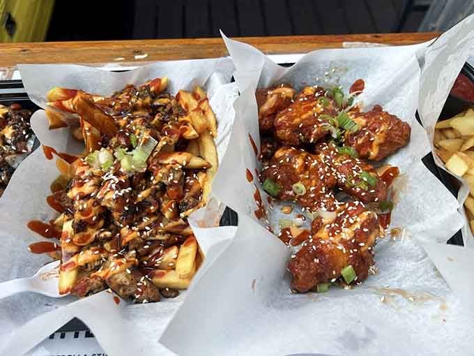 Wings and fries get the retro treatment with sesame seeds and sauce, perfect for soaking up those craft cocktails.