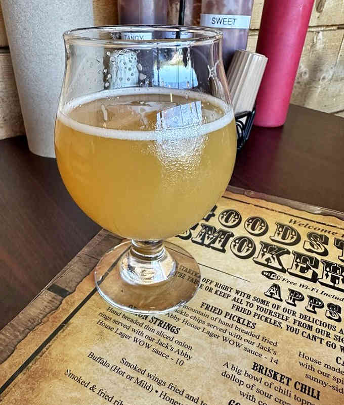 Local craft beer in a proper glass, because even casual barbecue joints deserve to do drinks right.