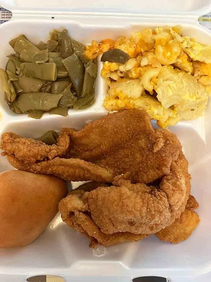 Fried catfish and chicken proving that sometimes the best things in life come with a really good cornmeal coating.