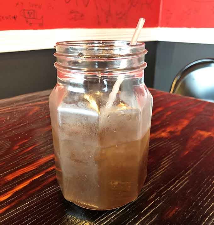 Sweet tea in a mason jar, because some traditions just make sense when you're eating barbecue.