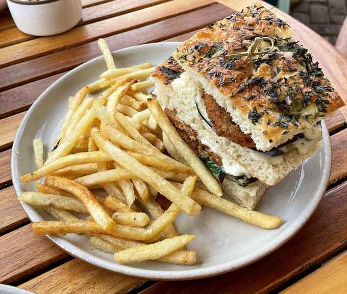 The Hatchatarian sandwich stacked high with melted cheese and greens, making vegetarian options look this good should be mandatory.