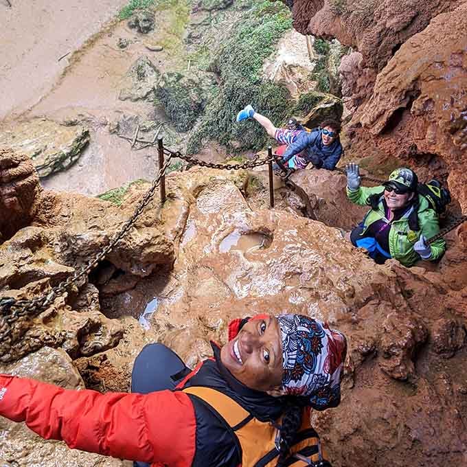 Navigating the chains down to Mooney Falls requires courage, but the view below makes every white-knuckle moment worthwhile.