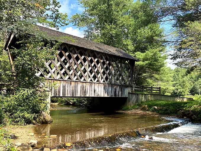 Covered bridges spanning gentle streams remind us that some engineering solutions are simply too charming to abandon.