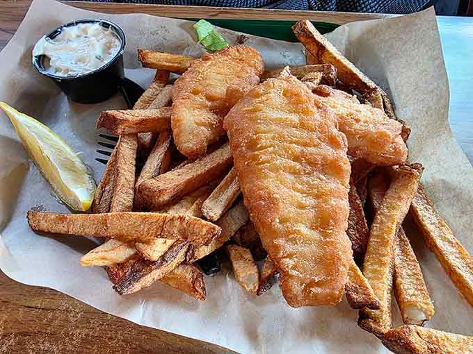 Fish and chips so crispy and golden, they deserve their own standing ovation and tartar sauce.
