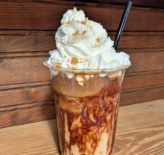 This towering frappuccino situation with whipped cream and caramel drizzle defies both gravity and calorie counting.