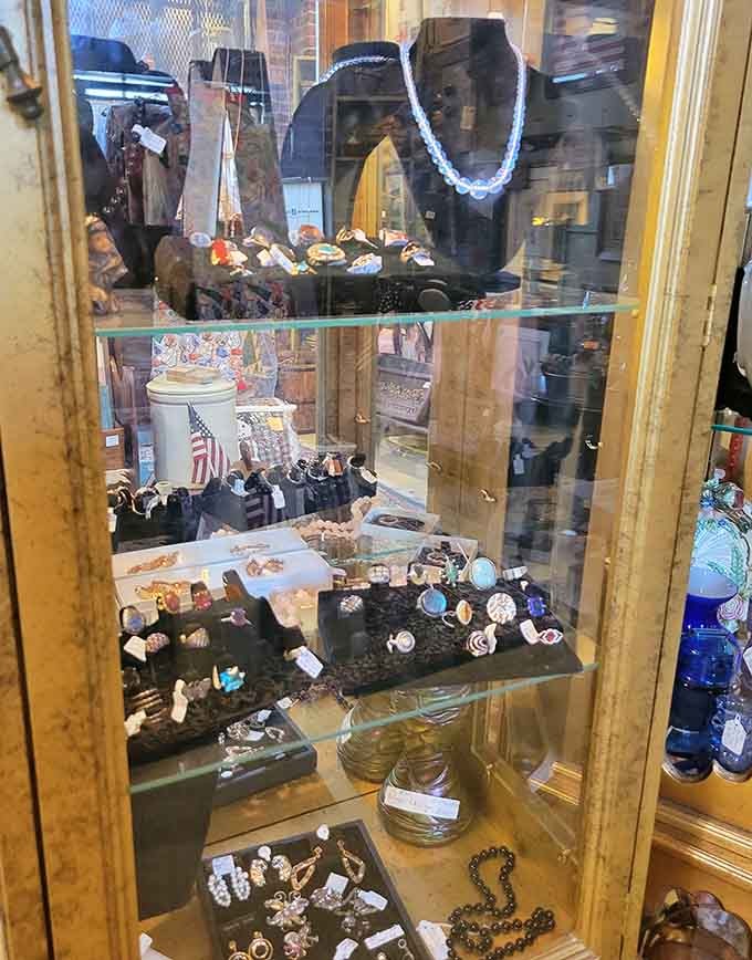 The jewelry case holds decades of sparkle, each piece carrying stories of celebrations and romances long past.