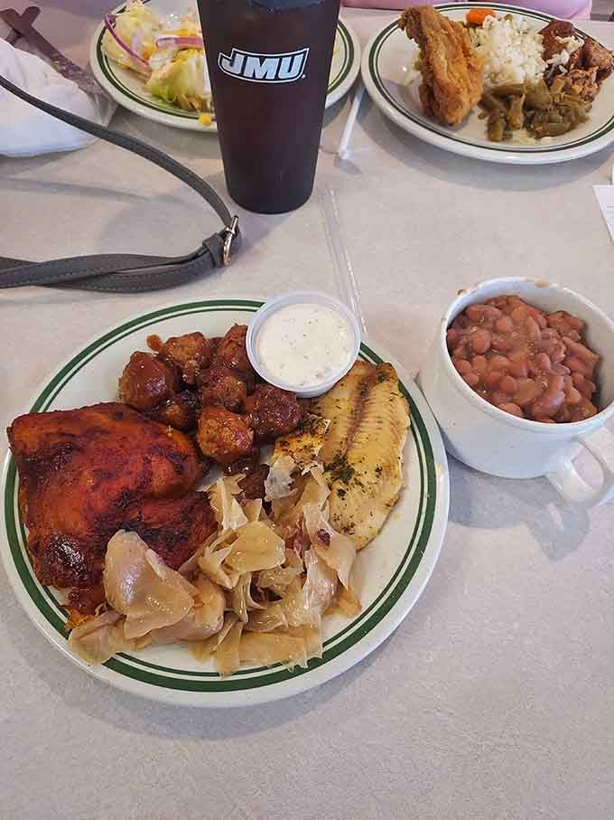 BBQ chicken, hush puppies, corn on the cob, and beans prove that variety on one plate is absolutely possible.