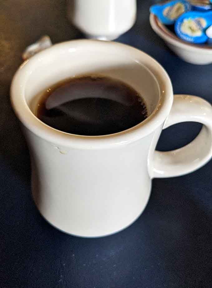 Simple, hot coffee in a classic mug, the perfect companion to any homestyle meal here.