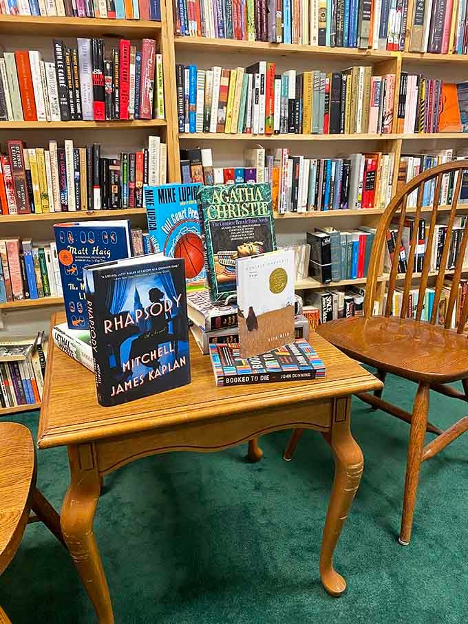 Agatha Christie and contemporary thrillers share space on this inviting table, proving mysteries never go out of style.