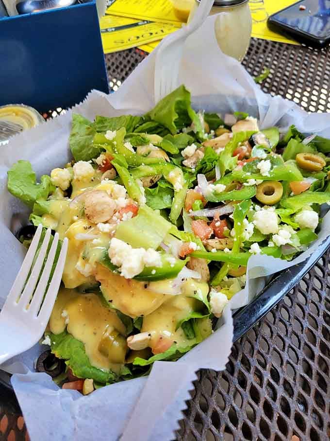 Fresh salad with feta and olives, because even beach towns know how to do healthy delicious.