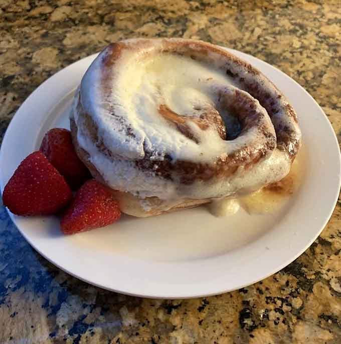 This cinnamon roll could double as a small pillow, and honestly, that's exactly the kind of portion we're here for.