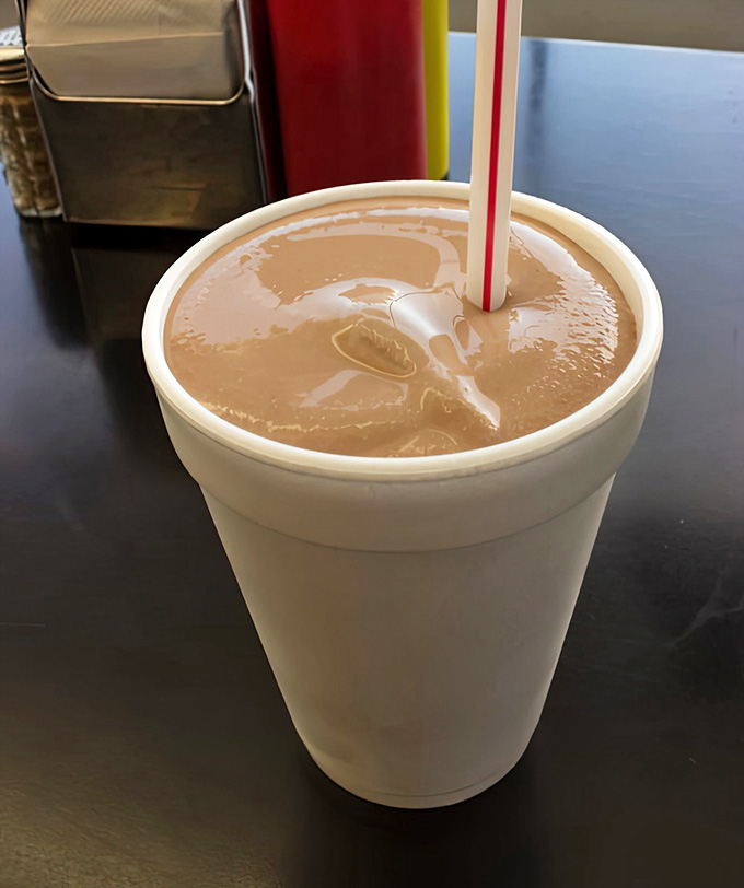 A chocolate shake so thick your straw might need a gym membership to get through it.