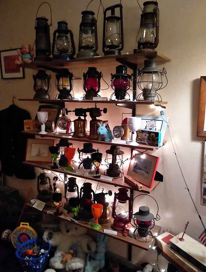 Vintage oil lamps line the shelves like sentinels, their flickering presence once illuminating secrets now lost to time.