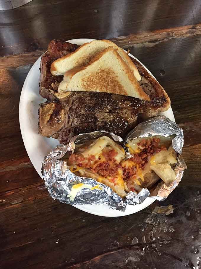That perfectly cooked steak with a loaded baked potato is basically a love letter written in beef and butter.
