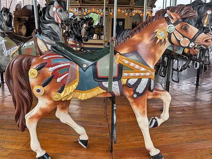Each horse tells its own story through hand-carved details that craftsmen perfected over a hundred years ago.