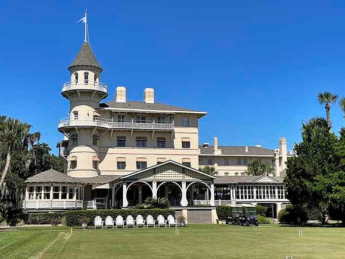 The Jekyll Island Club Resort's turret rises above the palms like a castle designed specifically for Southern royalty.
