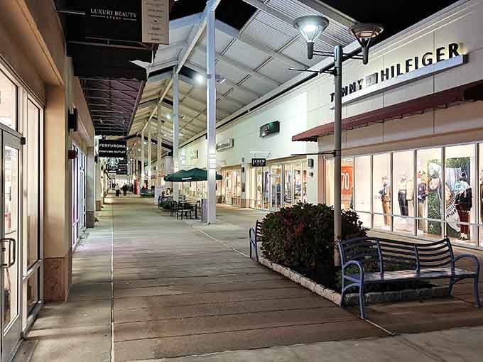 The outdoor walkways let you shop under actual sky, breathing real air between stores like a civilized human being.