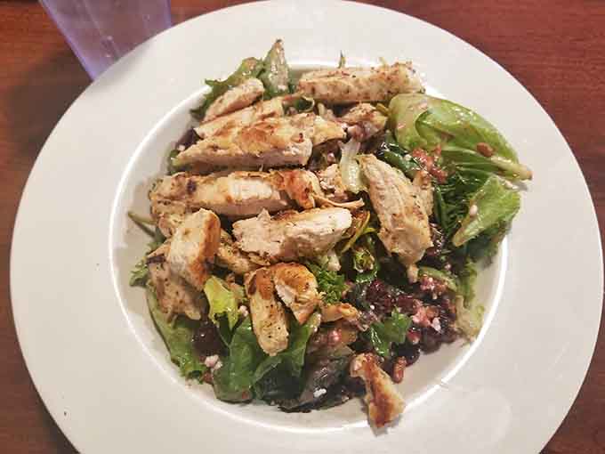 Fresh greens topped with perfectly seasoned chicken prove that salads don't have to be punishment for last night's dessert.