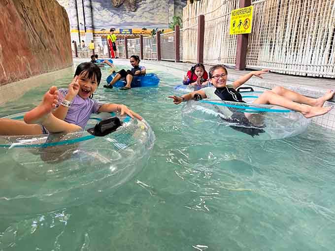 The lazy river: where families float together in peaceful harmony, at least until someone splashes someone else.
